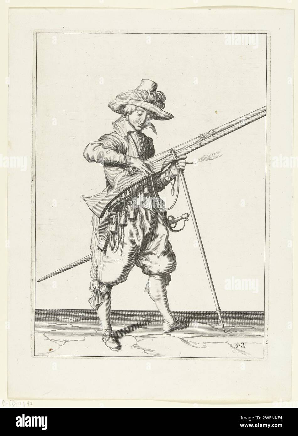Soldier on guard who gives the wick on the rooster of his musket the ...