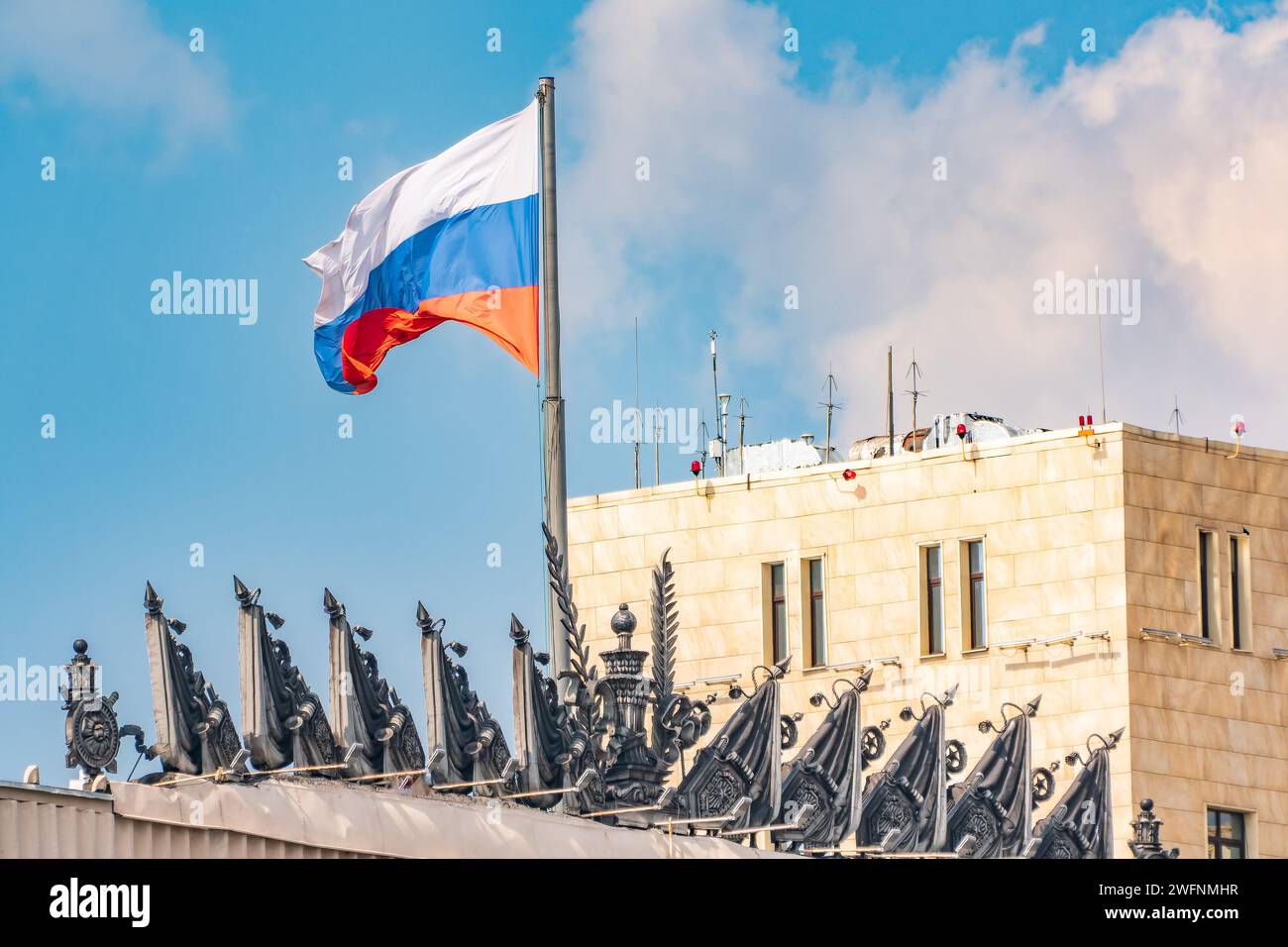 Waving national flag of russian federation on top of government stalin ...