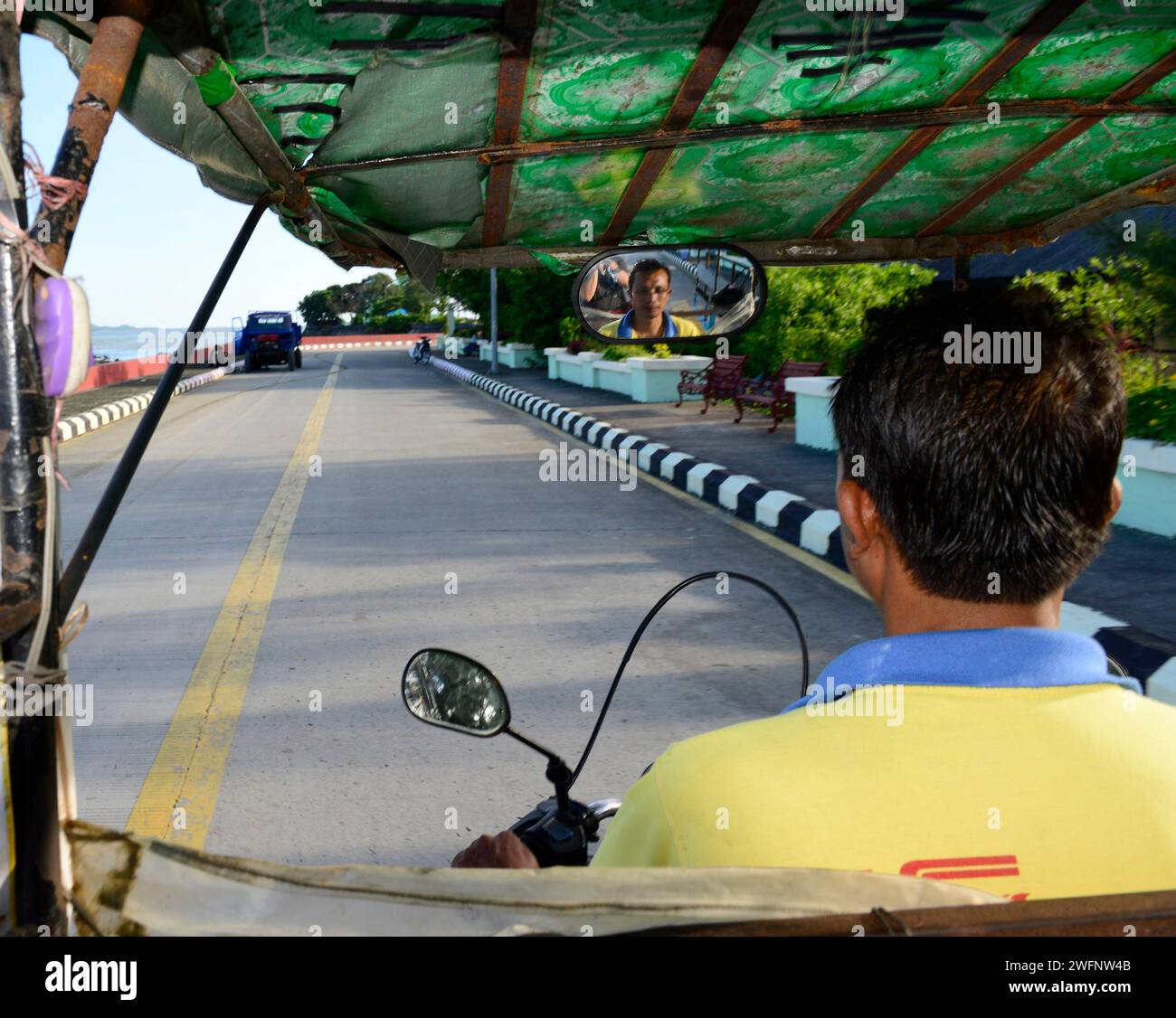 Traveling by a Burmese auto rickshaw to the beach in Sittwe, Myanmar ...