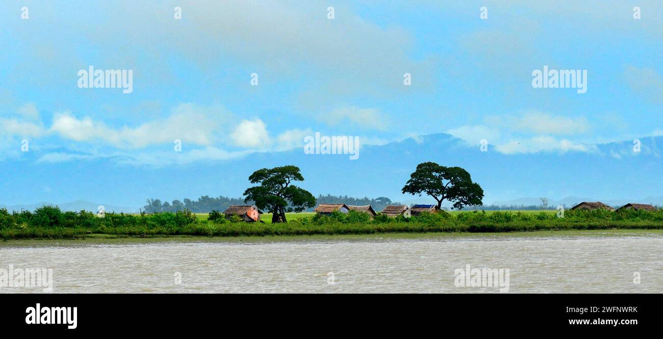 Misty mountains after a rainy morning seen from the Kaladan river in ...