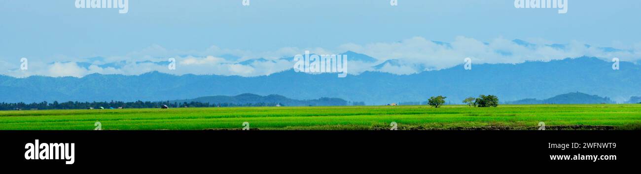 Misty mountains after a rainy morning seen from the Kaladan river in ...
