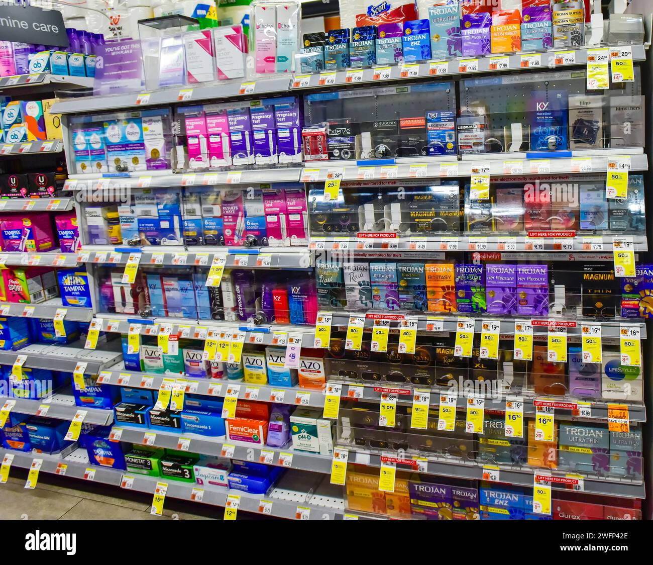 Drug store shelves, with women health and sexual heath products on ...