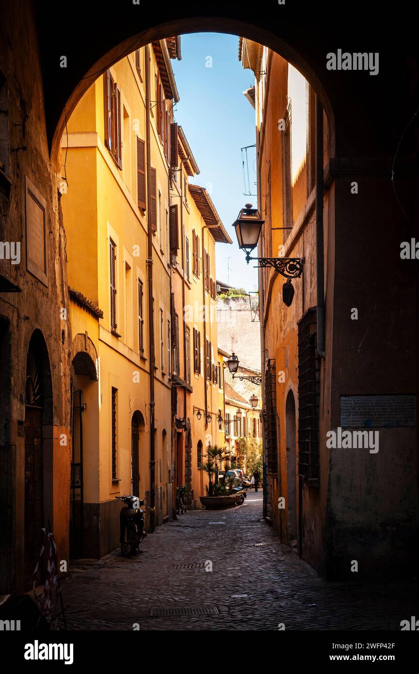 Cobblestone alleyway in the historic centre of Rome, Italy Stock Photo ...