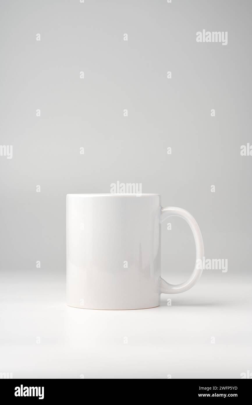 Blank white coffee mug mock up on white background Stock Photo - Alamy