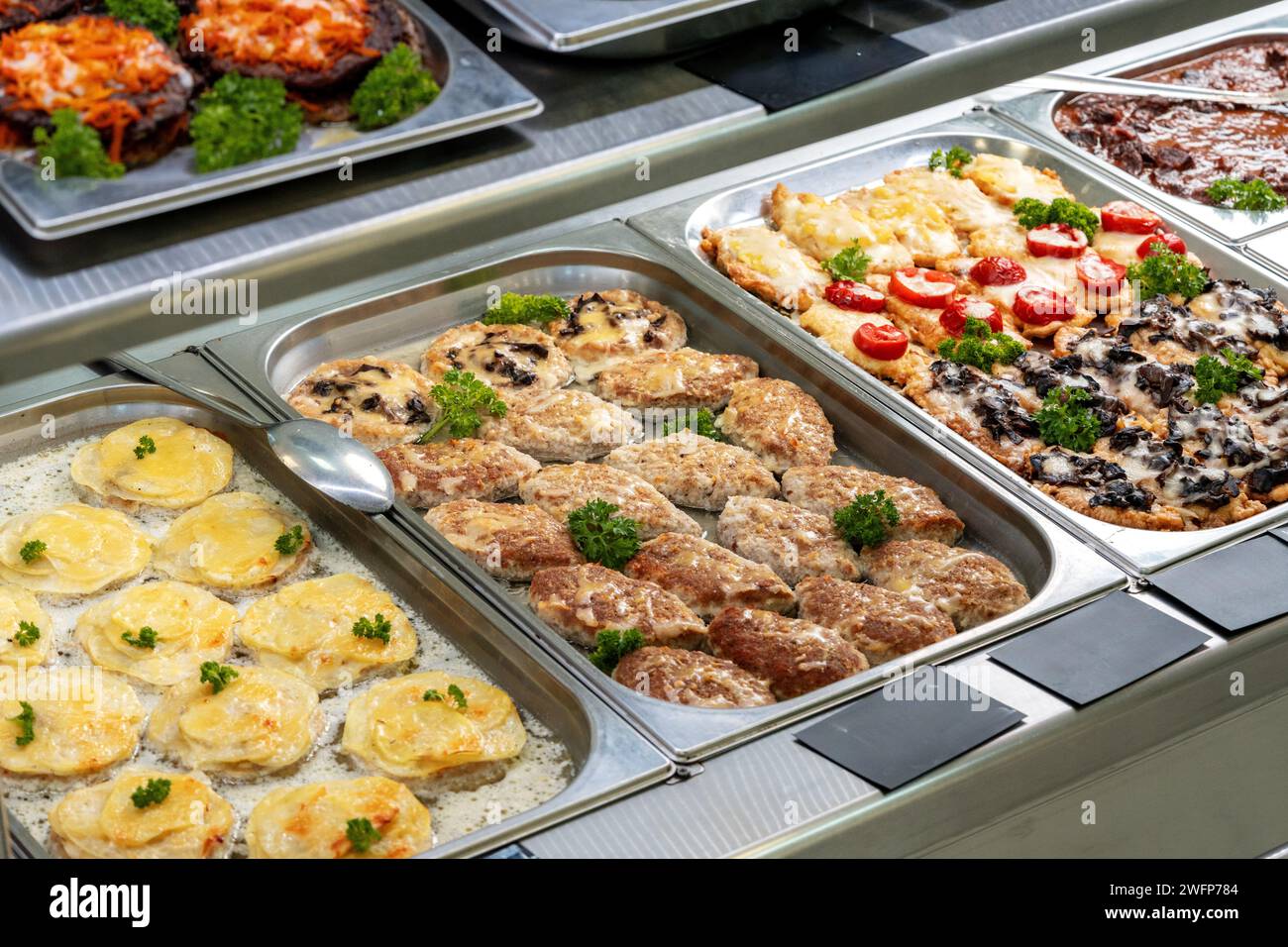 Display with fresh cooked food in a canteen Stock Photo - Alamy