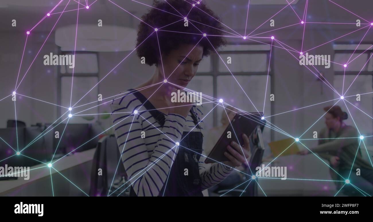 Image of network of connections over african american businesswoman ...