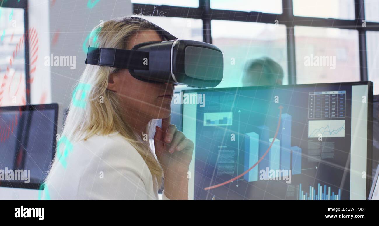 Woman explores virtual reality in hi-res stock photography and images ...