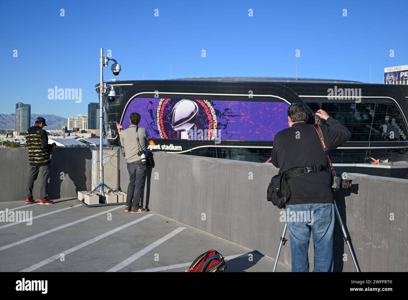 Associated Press photographer John Locher (left) and Getty Images ...