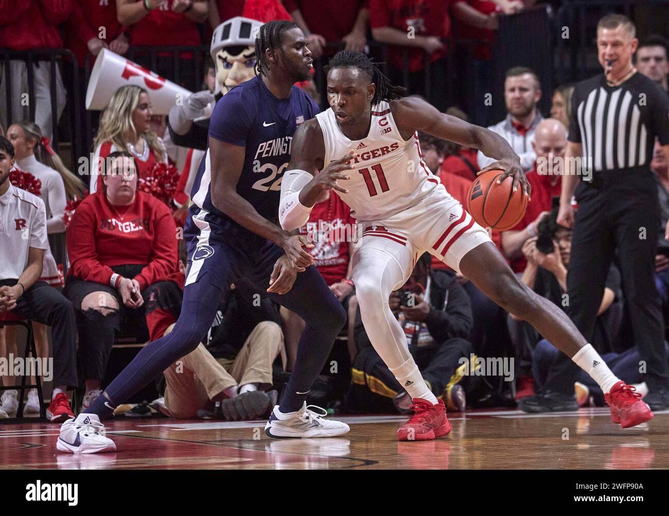 Rutgers Scarlet Knights center Emmanuel Ogbole (22) tries to get in the ...