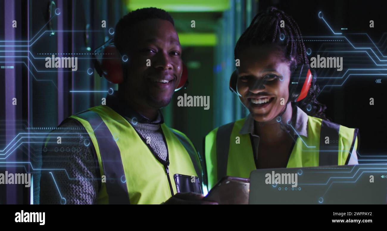 Image of integrated circuits over african american woman and man ...