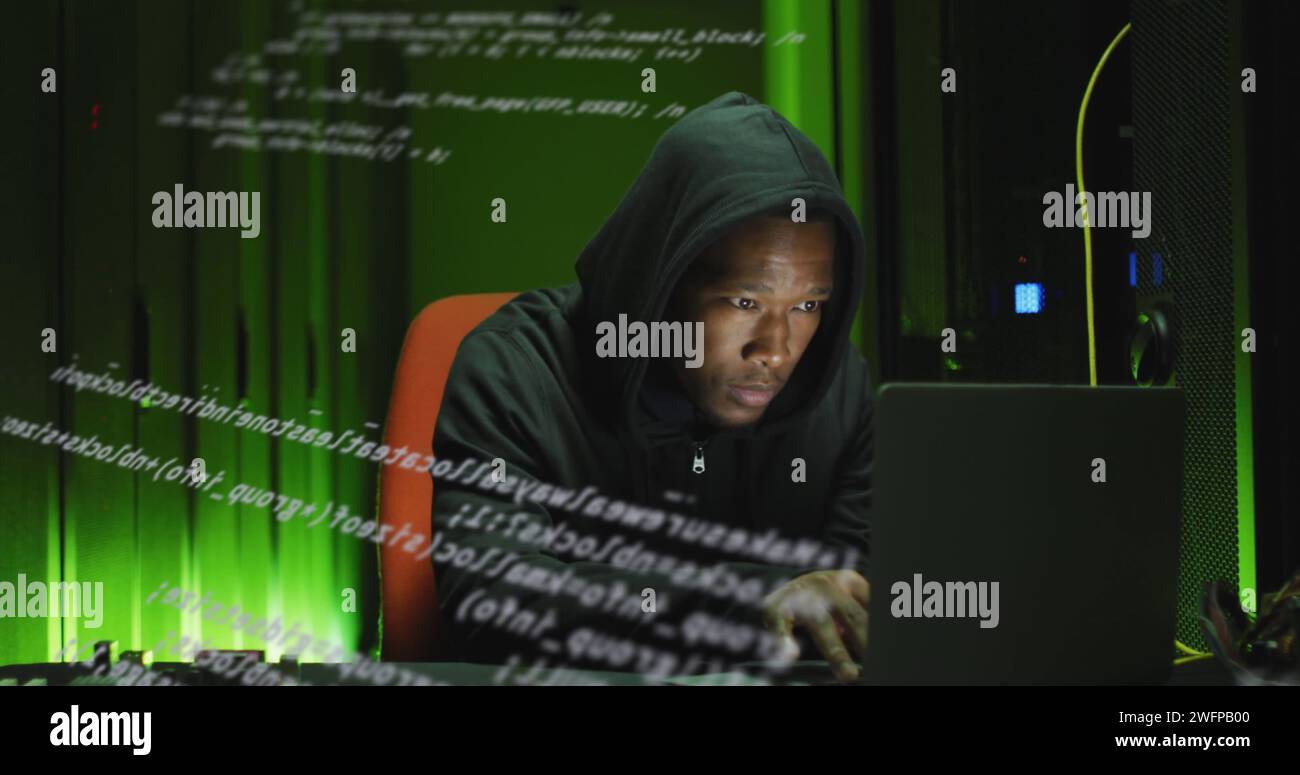 Image of data processing over african american man working on laptop in server room Stock Photo ...