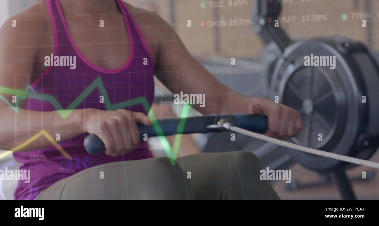 Image of data processing on graph over happy biracial woman training on ...