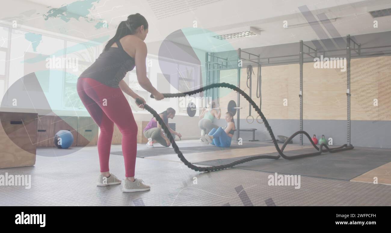 Image of data on interface over caucasian woman cross training with ...