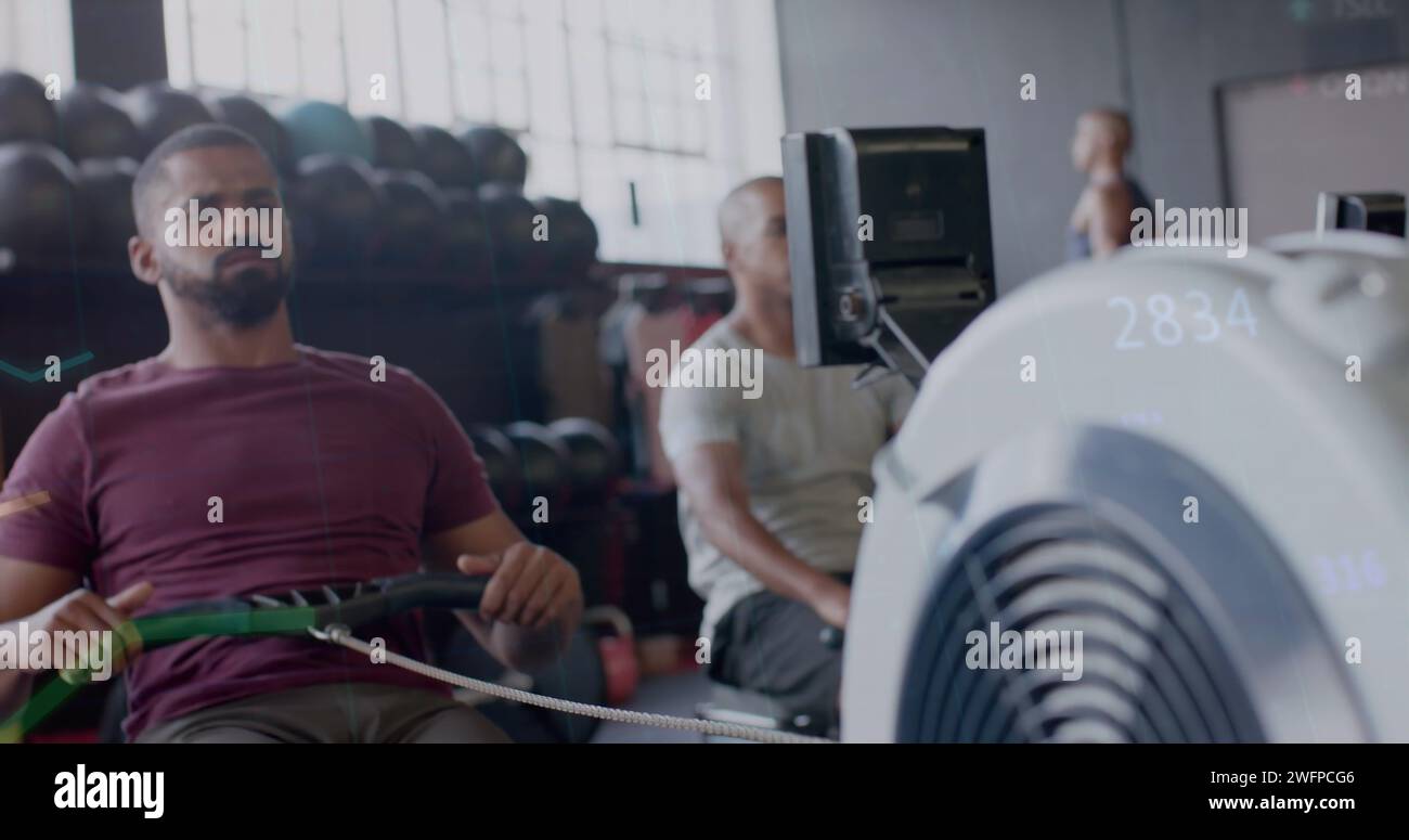 Image of data processing on graph over diverse men training on rowing ...