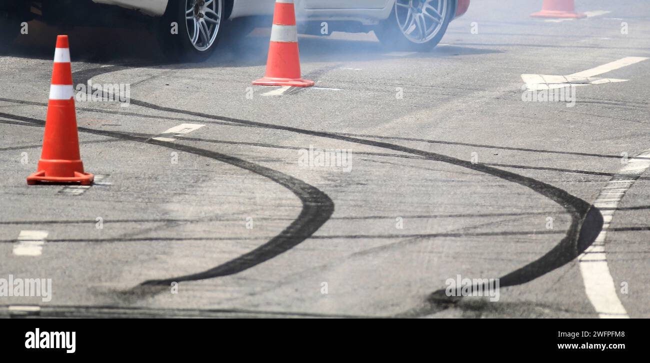 Emergency braking wheel with smoke on the road Stock Photo - Alamy