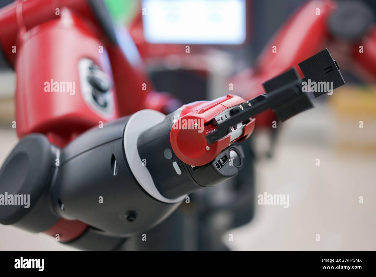 An artificial robotic hand working in a factory Stock Photo - Alamy