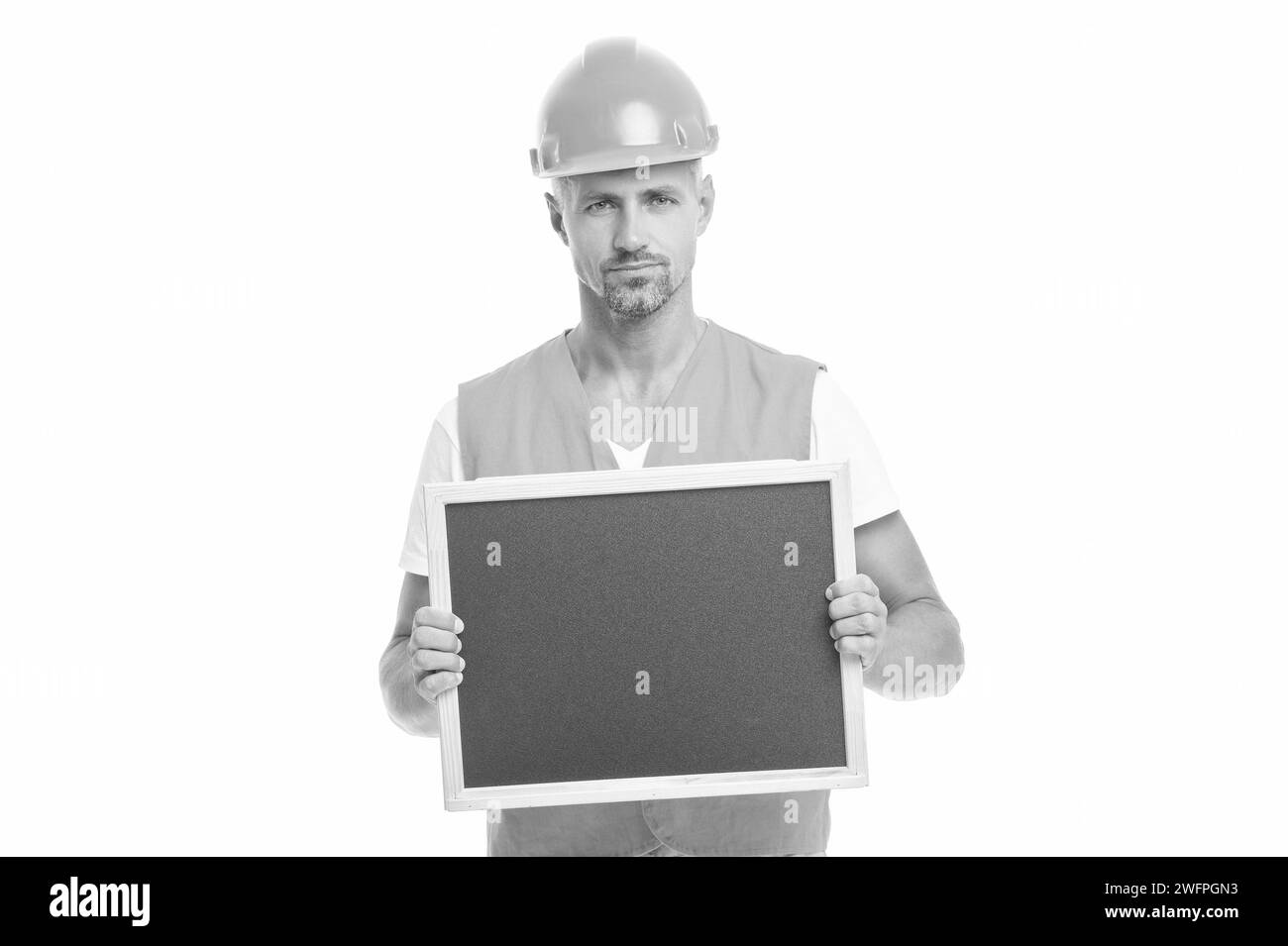 worker showing advertisement in white studio. worker show advertisement ...