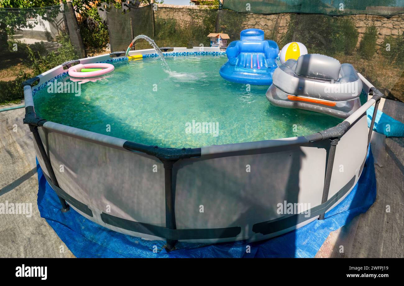 Backyard play pool swimming water hi-res stock photography and images ...