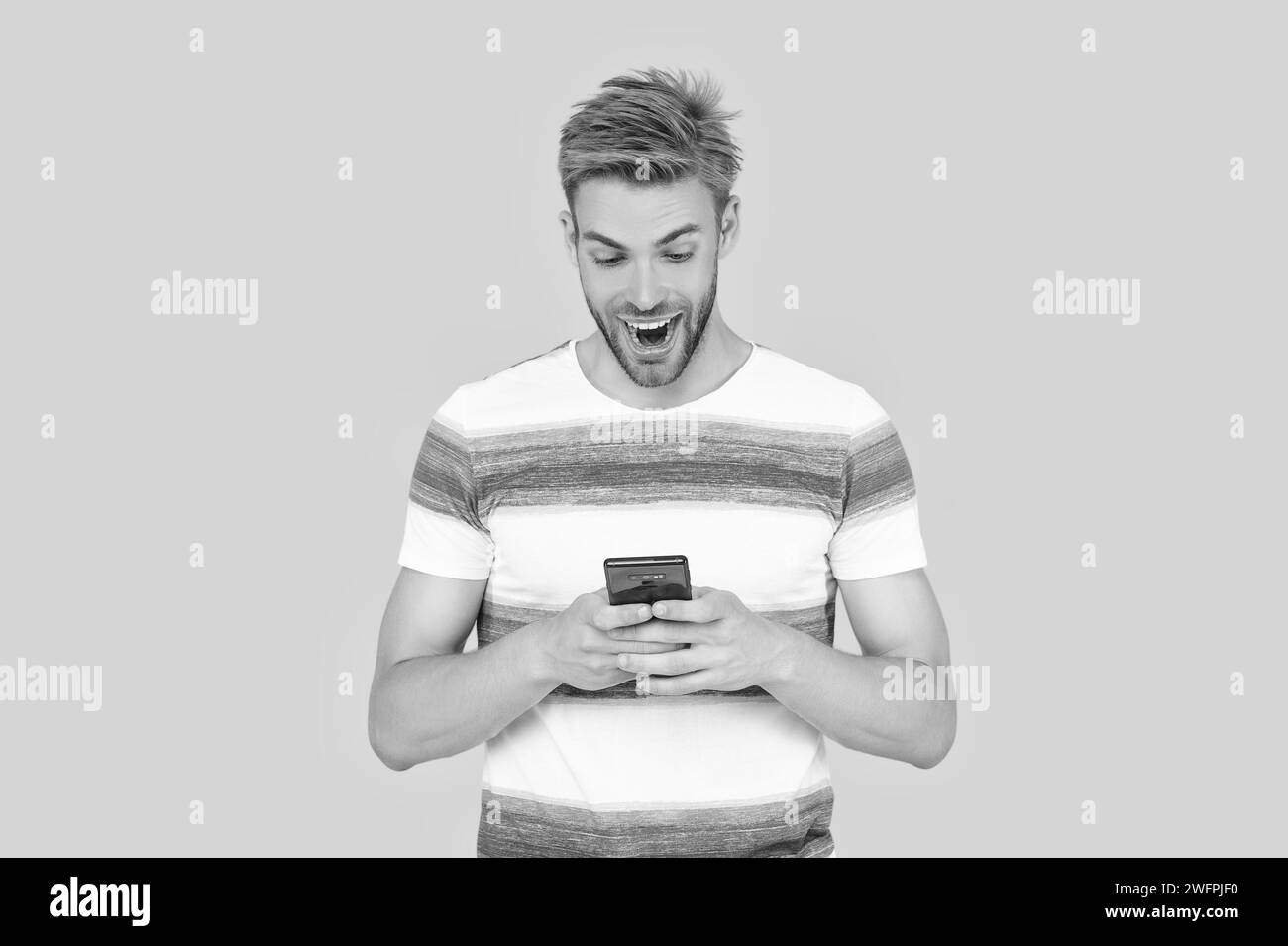 Amazed Man Uses Phone To Make Effective Communication Man Has Phone Communication Digital