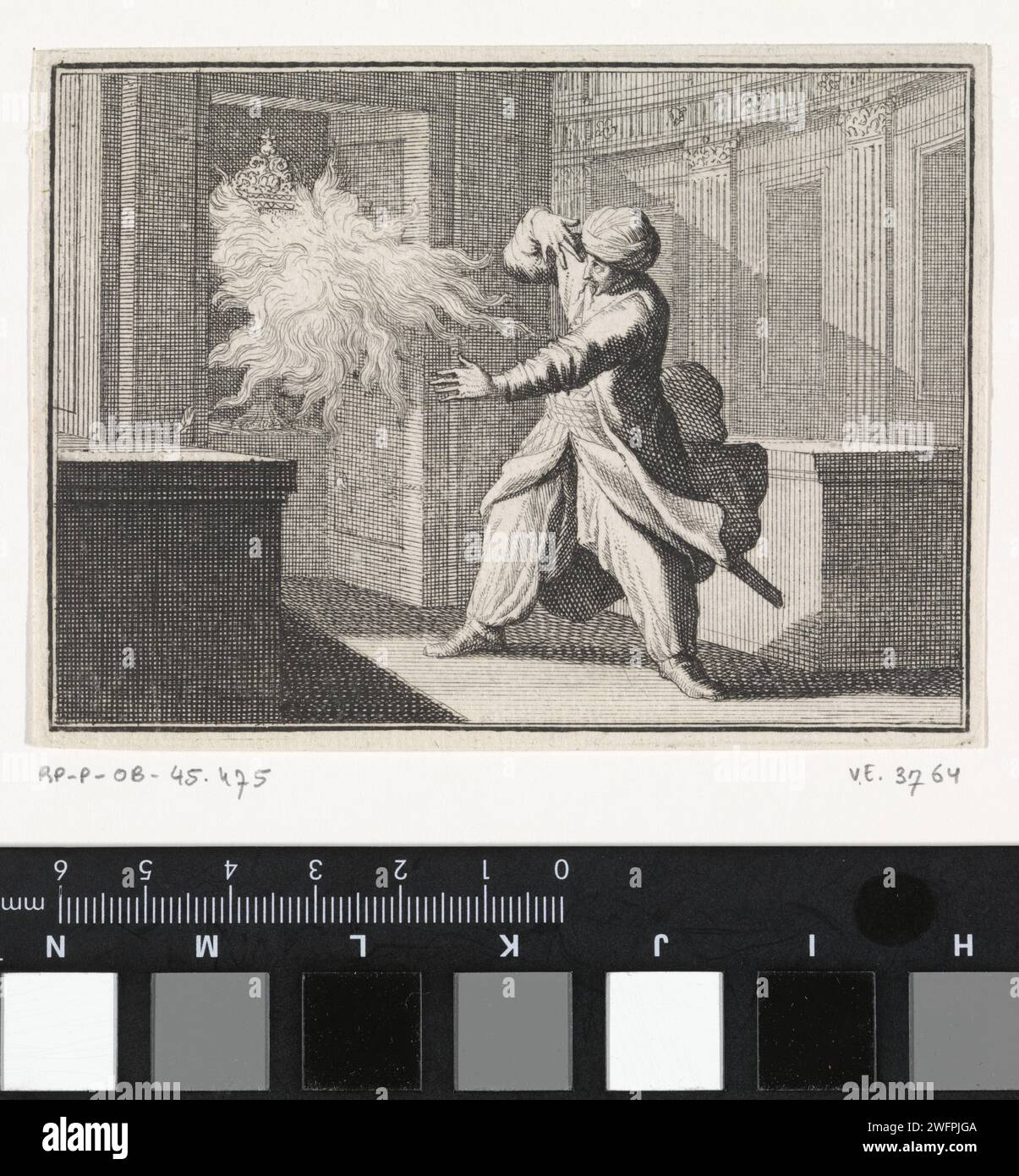 Eastern man looks out of curiosity in a cupboard at a hostic milk where ...