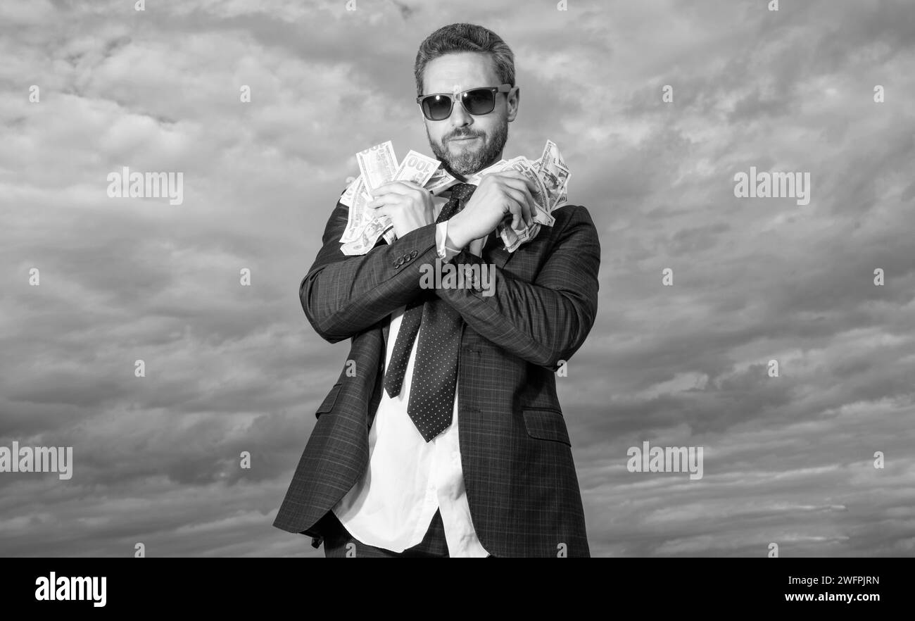 photo of billionaire man show money. billionaire man with money on sky ...