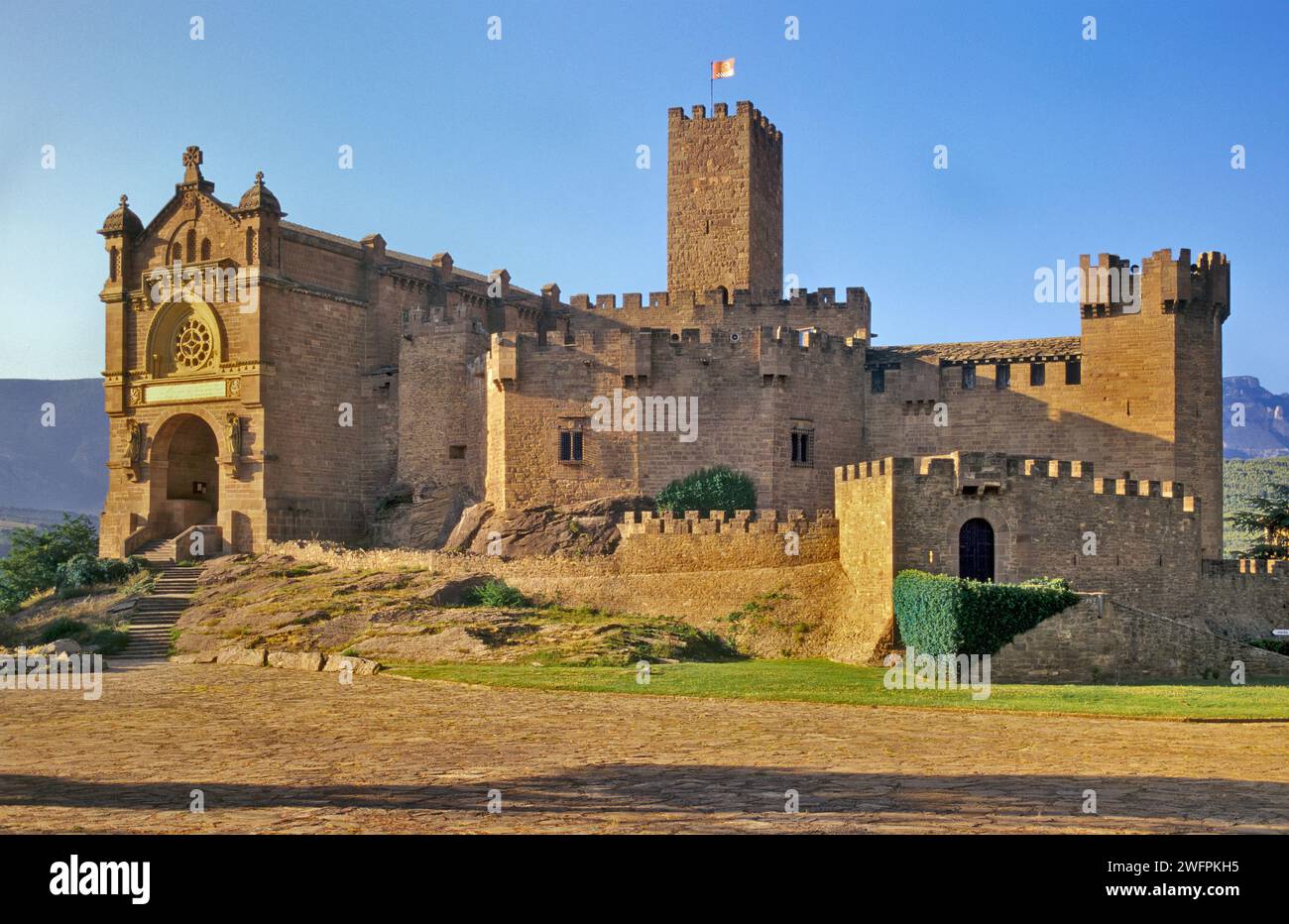 Castillo de Javier, 10th century, at sunset, basilica on left, castle ...