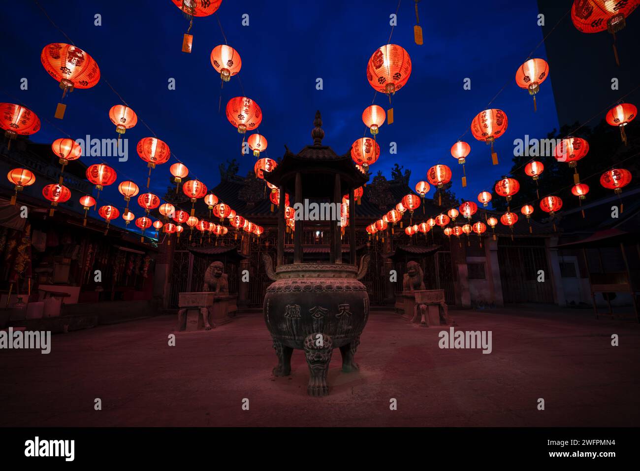 The Chinese Goddess of Mercy temple, Kuan Yin Teng, statues illuminated ...