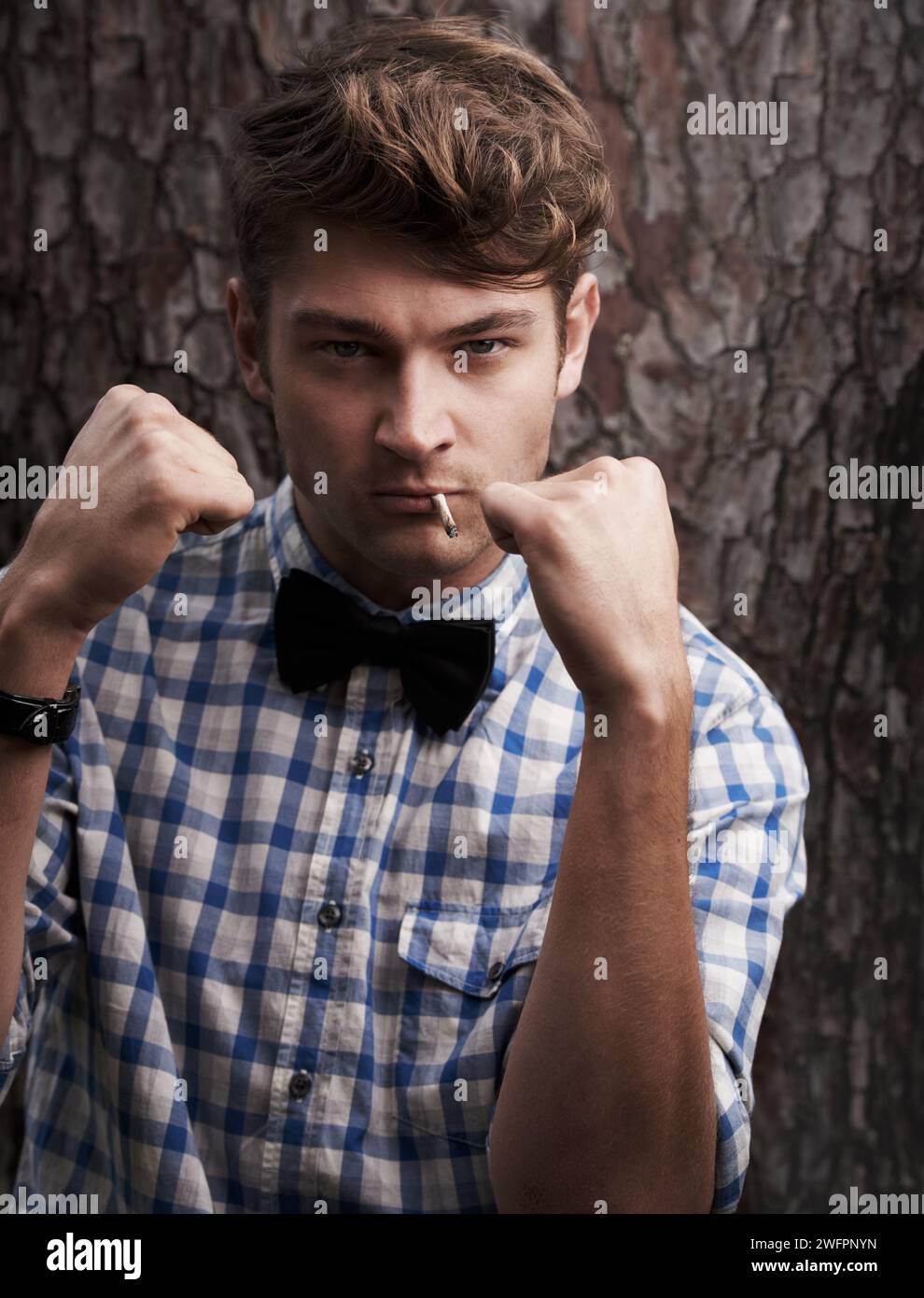 Man smoking cigarette in the forest hi-res stock photography and images ...
