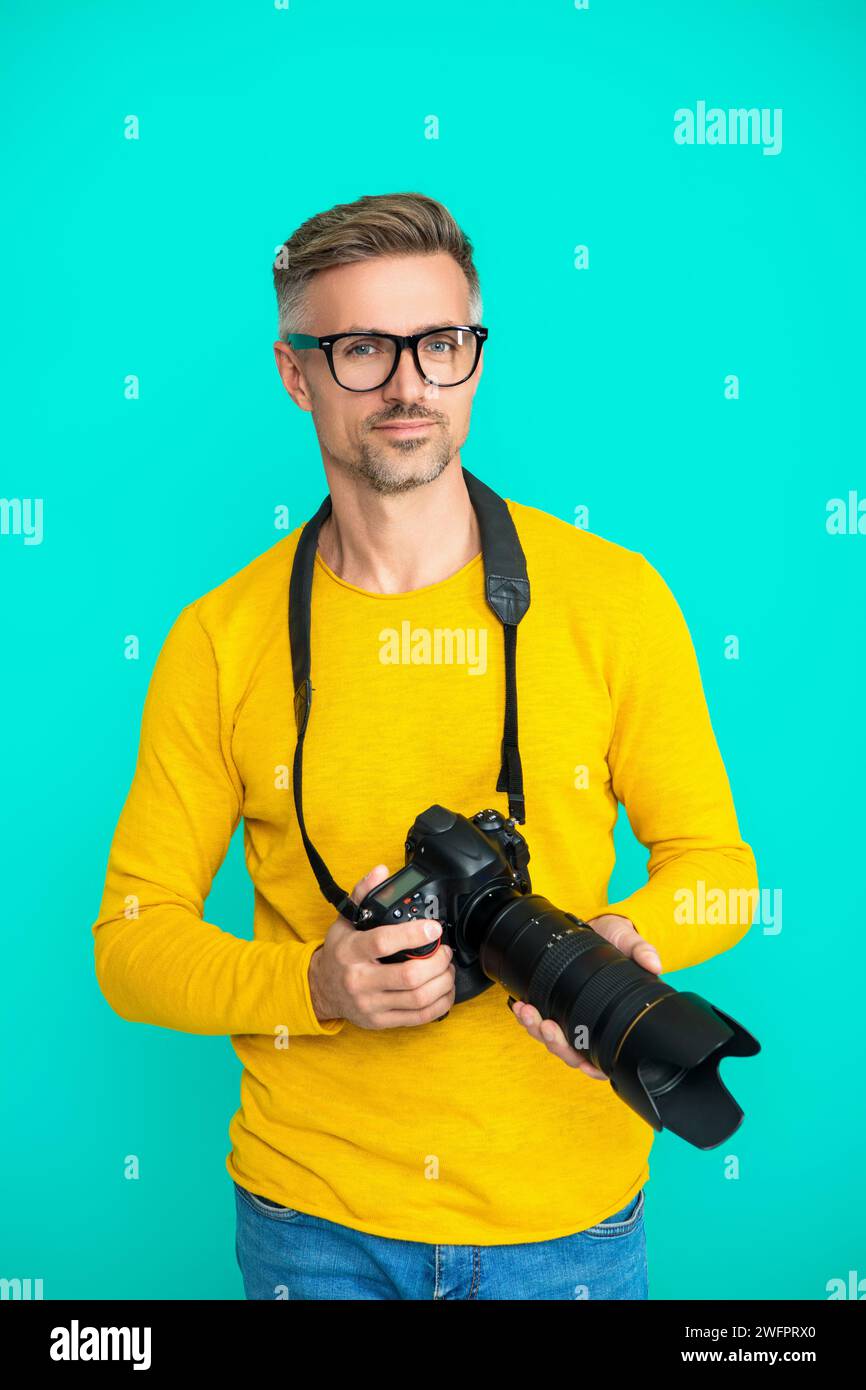 Professional photography. Shooting session. Photoshoot. Man taking ...