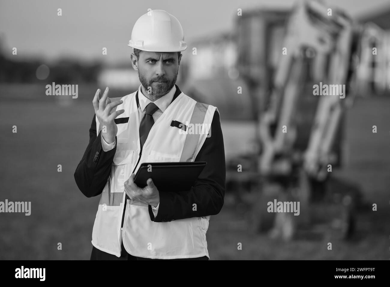 serious supervisor man wearing helmet. photo of supervisor man ...