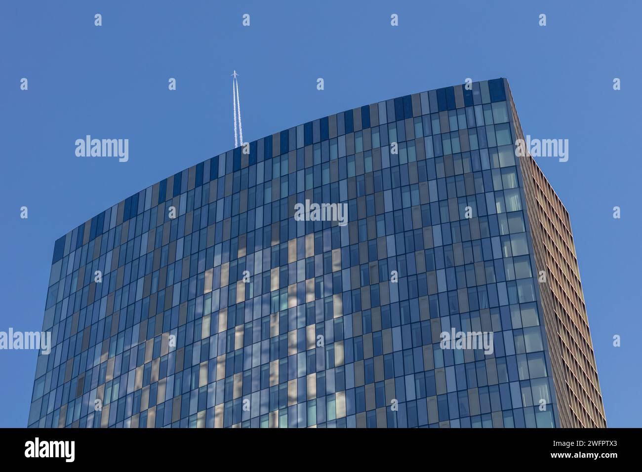 The Blade residential tower with a plane flying over Manchester. Part ...