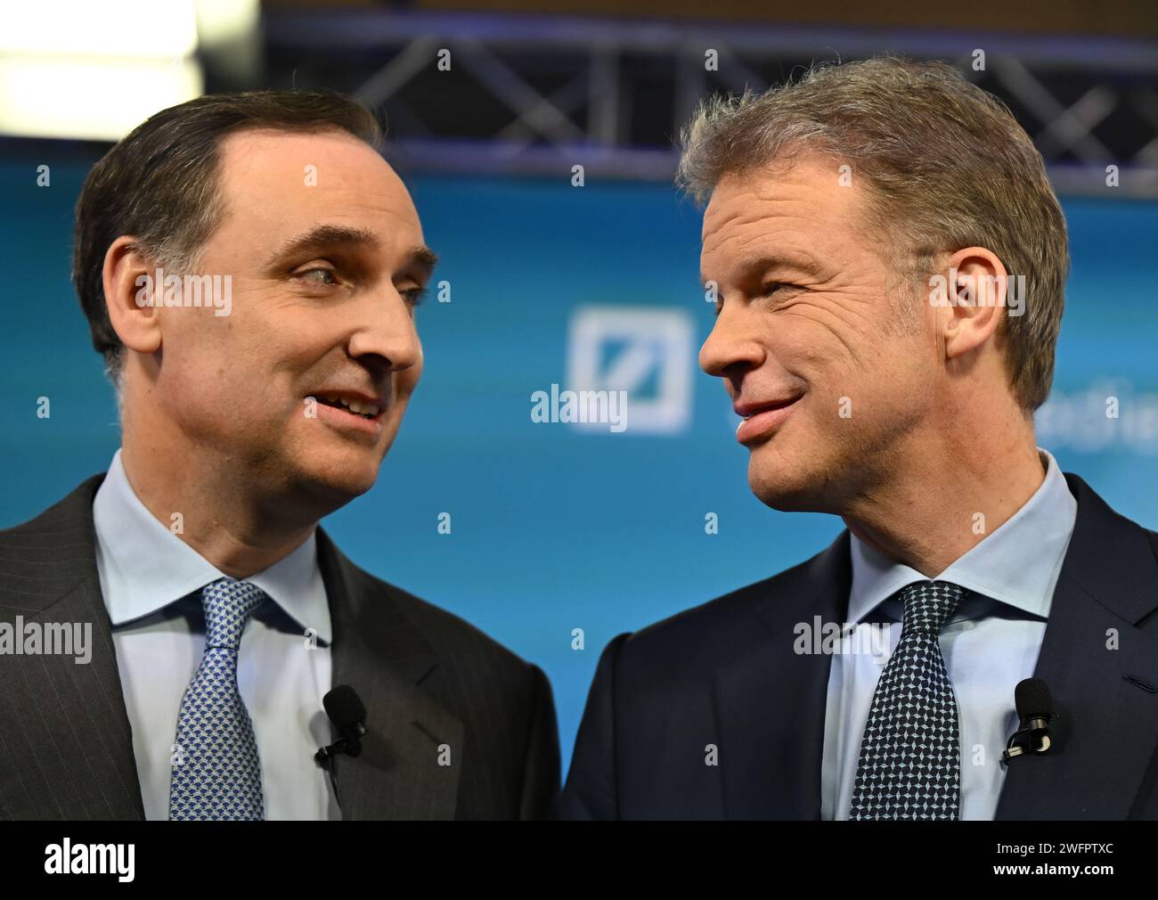 01 February 2024, Hesse, Frankfurt/Main: Christian Sewing (r), CEO of ...