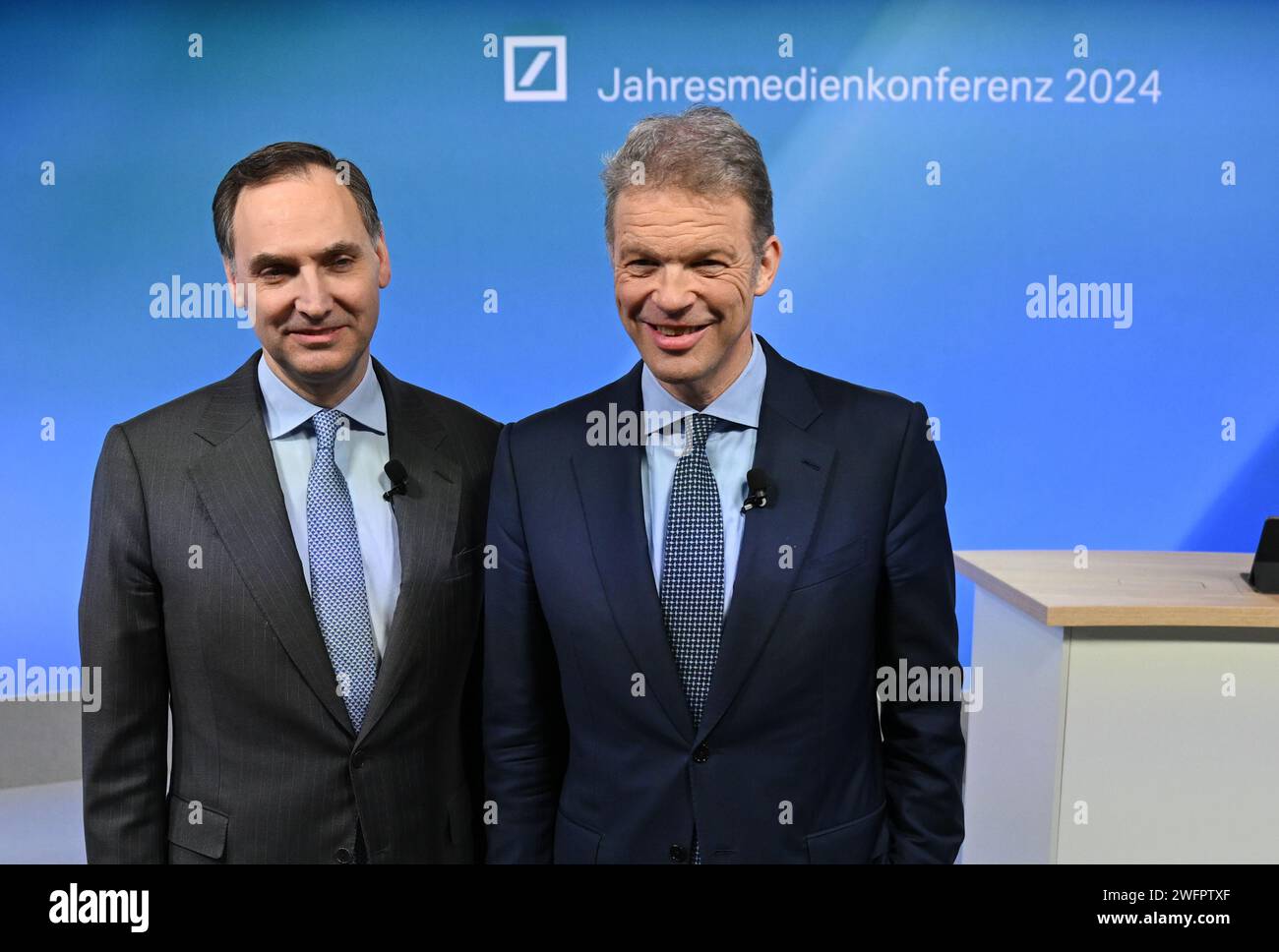01 February 2024, Hesse, Frankfurt/Main: Christian Sewing (r), CEO of ...