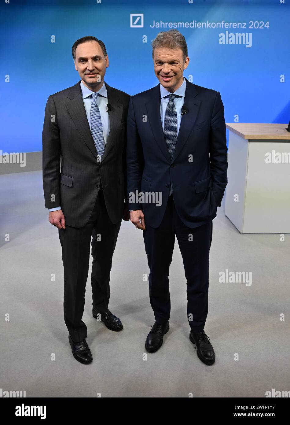 01 February 2024, Hesse, Frankfurt/Main: Christian Sewing (r), CEO of ...