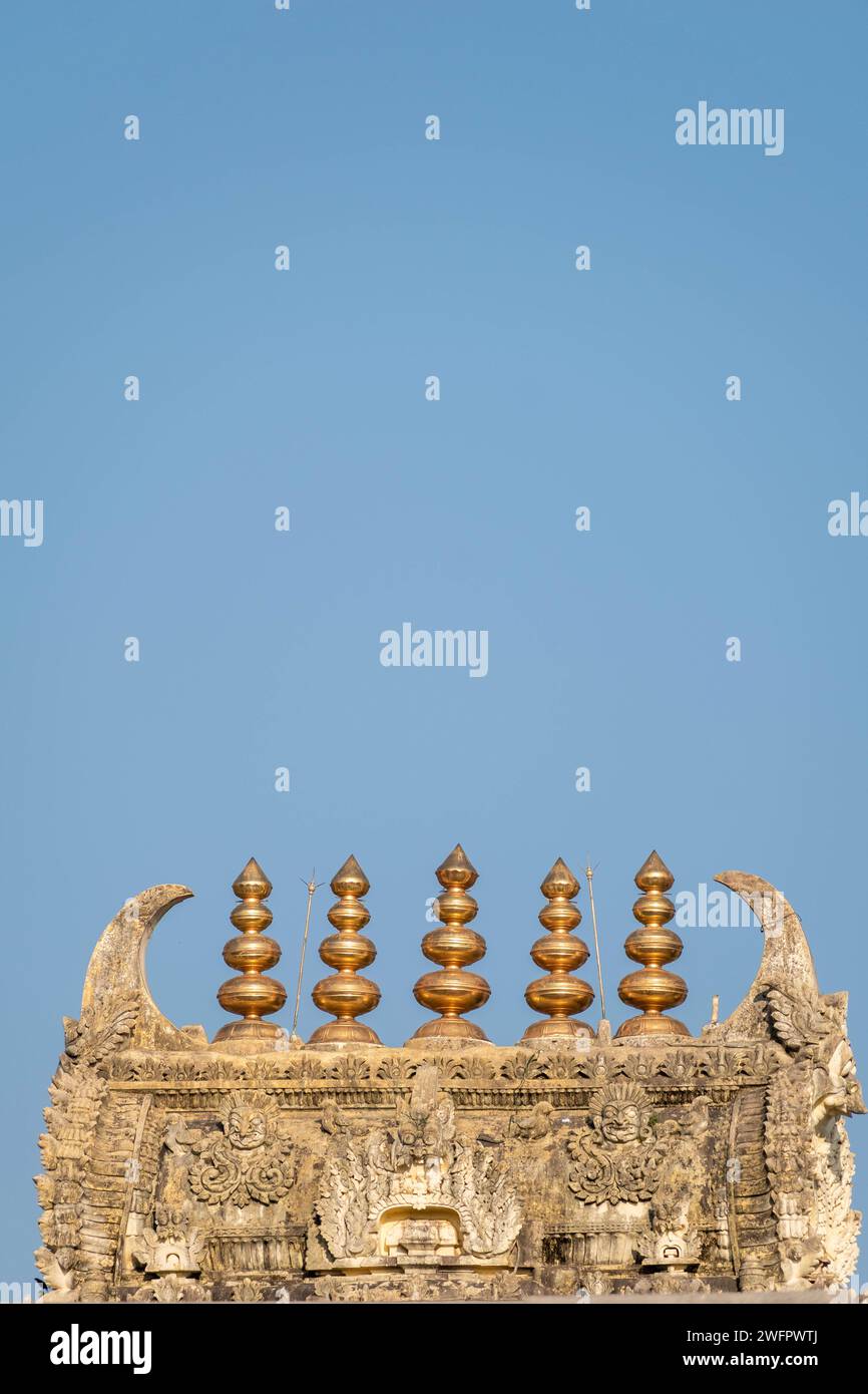 Detail of the gilded finials on the roof of the gopuram tower of the ...
