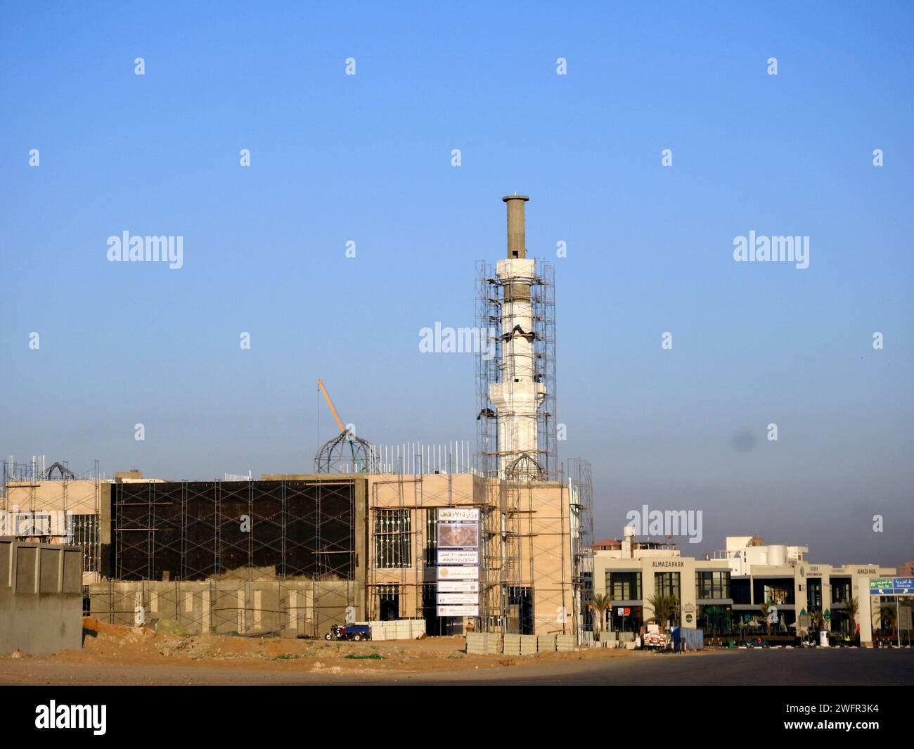 Cairo, Egypt, January 6 2024: A construction site of a new mosque with ...