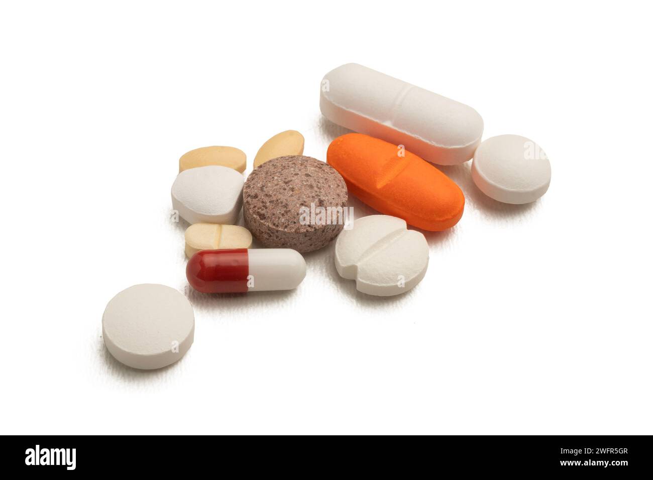 Pills of various shapes and colors isolated on white background Stock ...