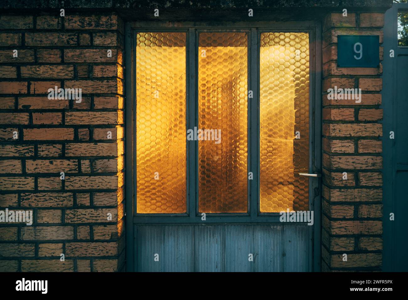 Old front yard entrance gate with number nine, selective focus Stock ...