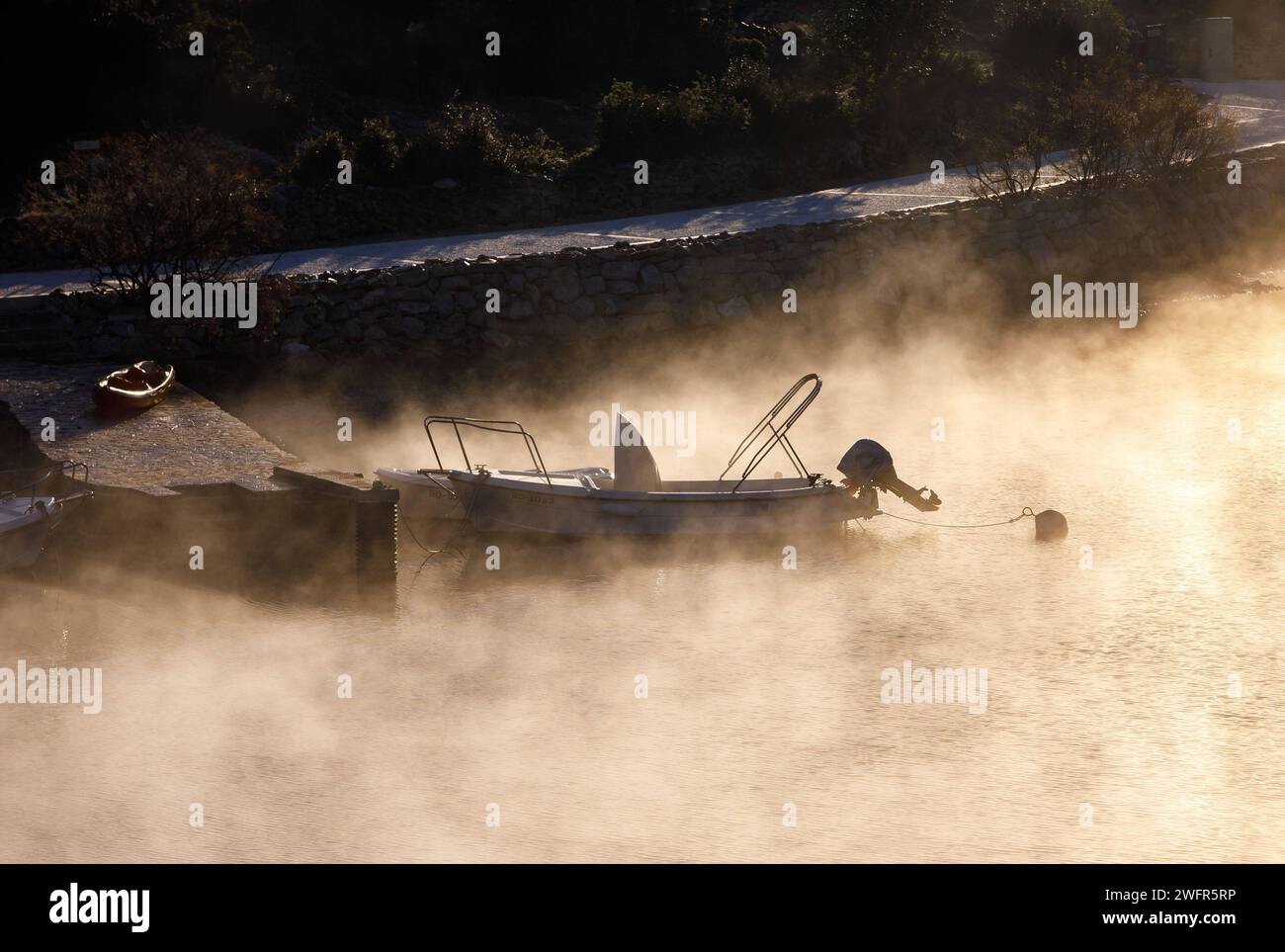 Solta, Croatia, 310124. Morning fog and salt in Piskera bay not far ...