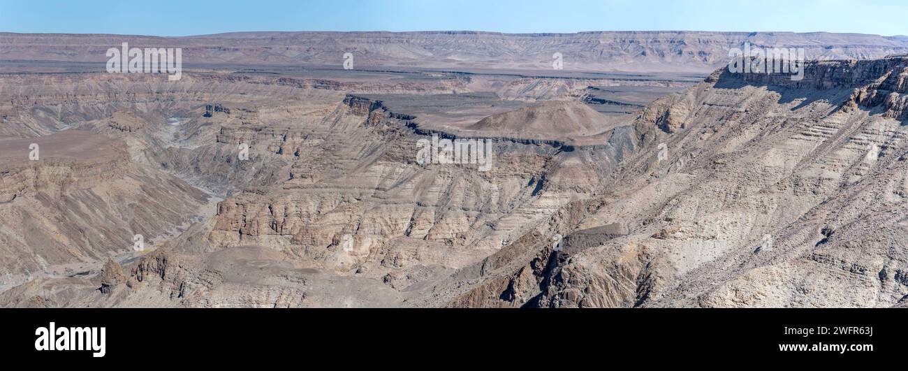 aerial landscape with escarpment worn slopes and meandering dry ...