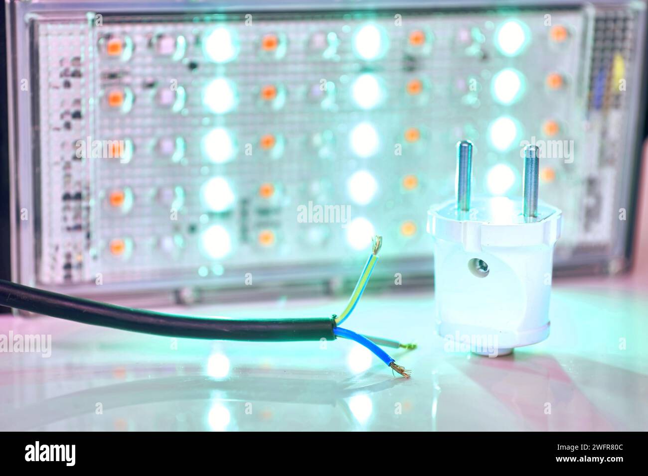 Electrical equipment connection. Core electric cable and light LED lamp ...