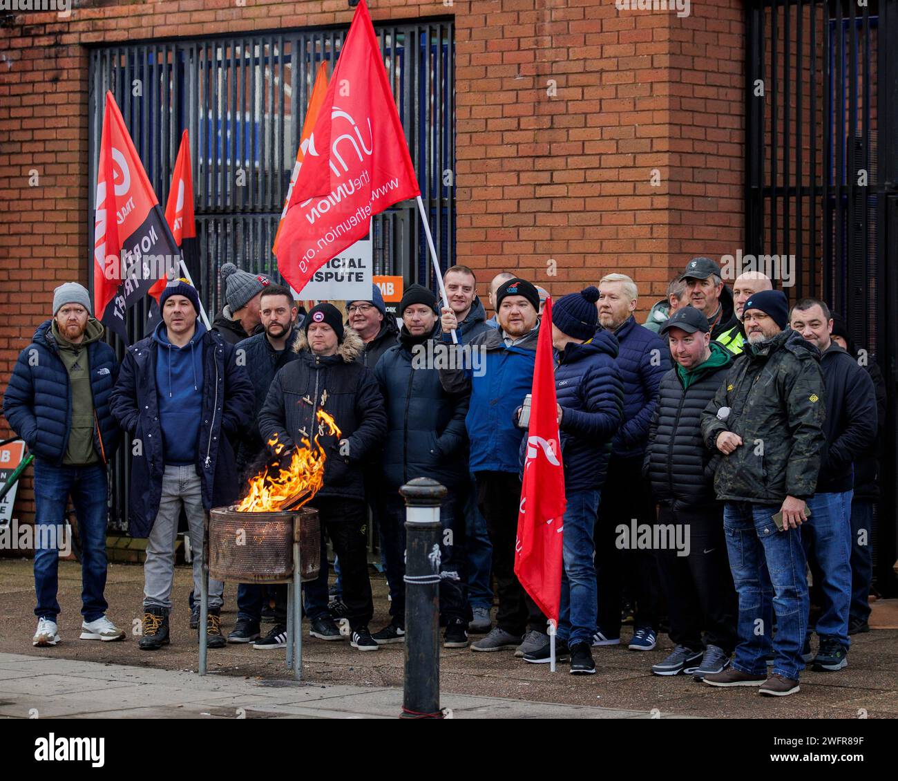 Members of Unite the Union and GMB on a picket line at Translink's ...