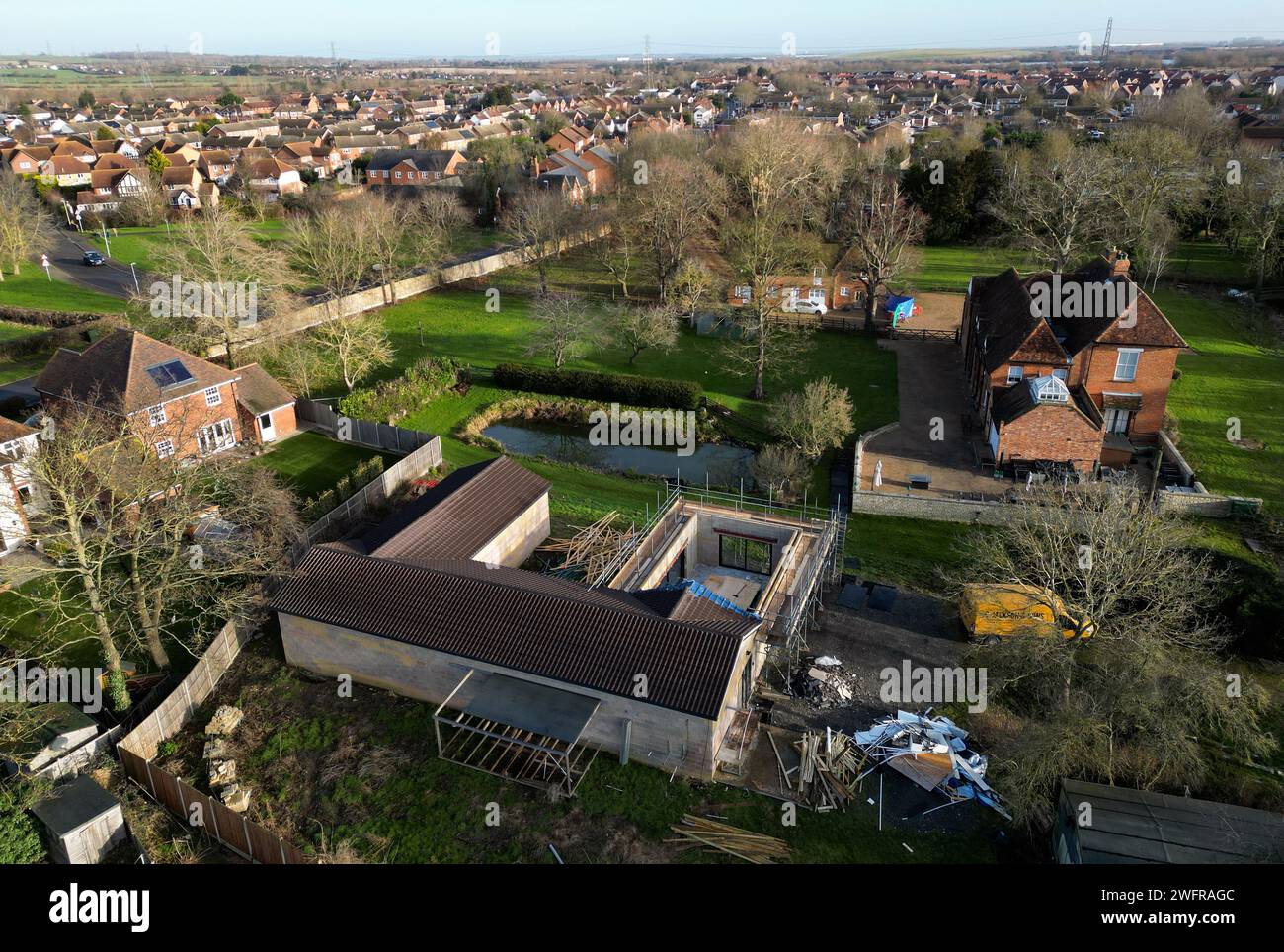 Work continues to demolish an unauthorised spa pool block at the home ...