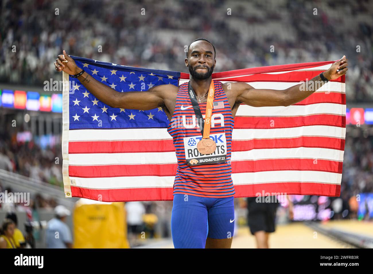 Daniel ROBERTS celebrating his medal with the flag in the Budapest 2023 ...