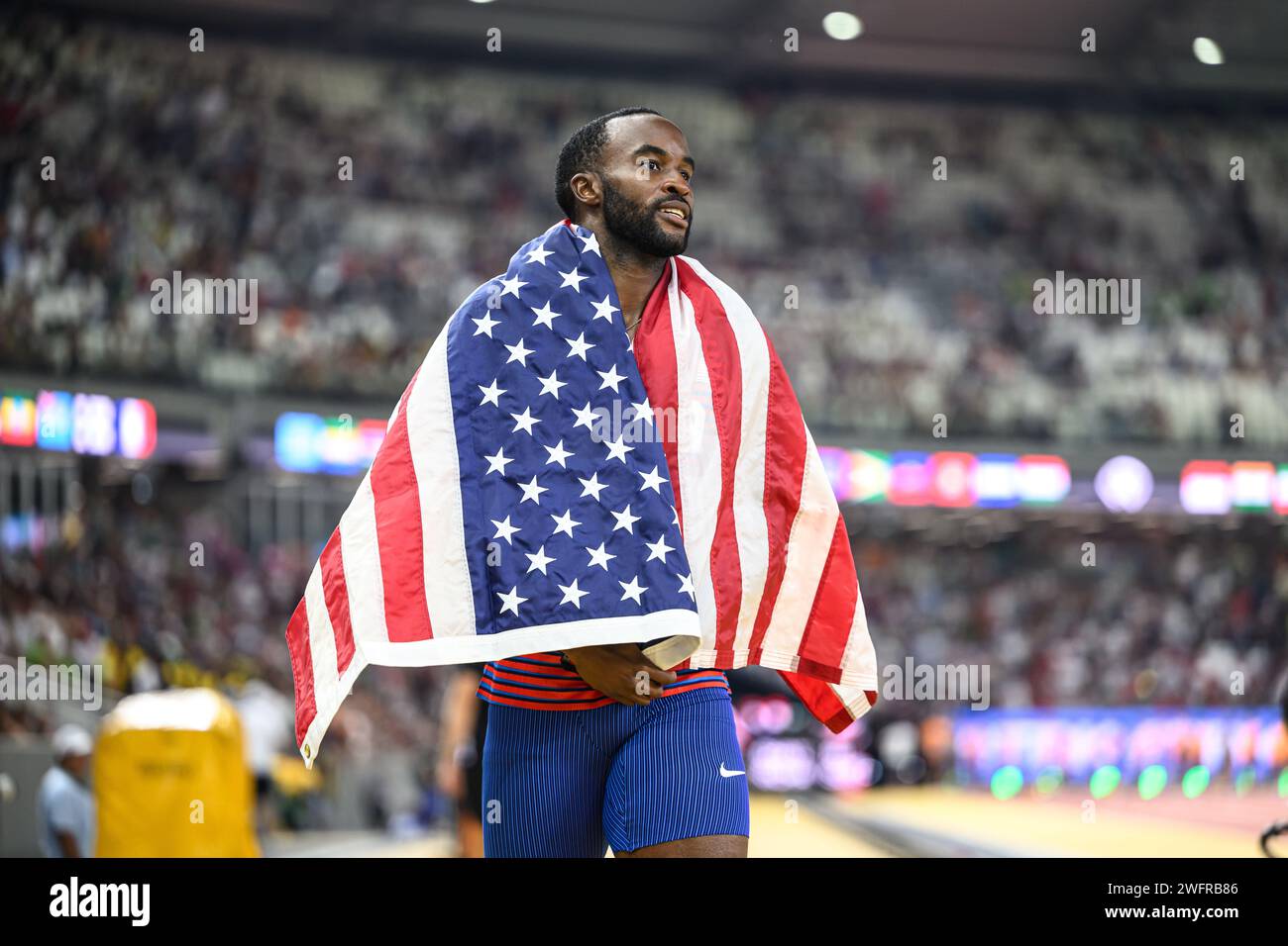 Daniel ROBERTS celebrating his medal with the flag in the Budapest 2023 ...