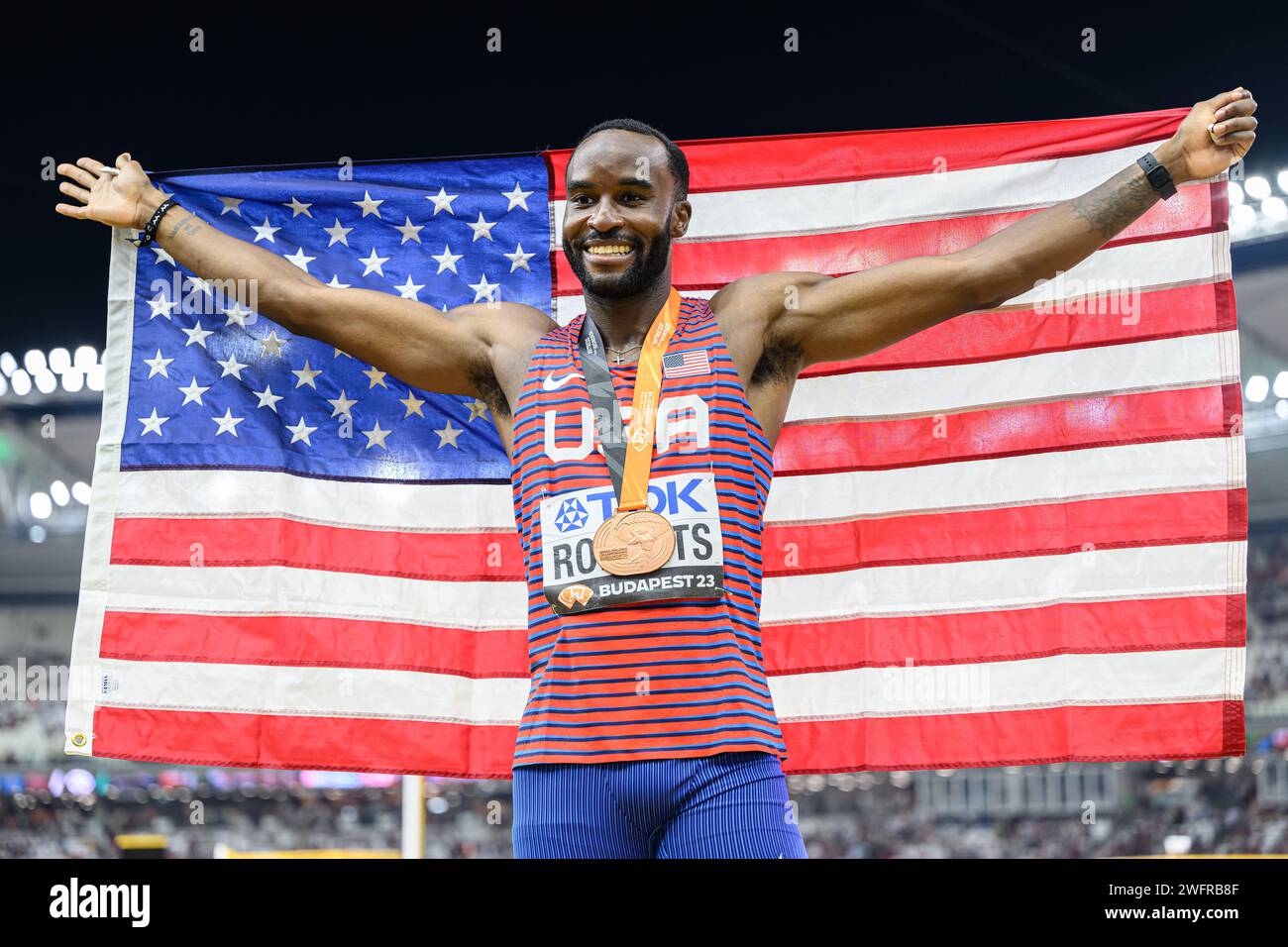 Daniel ROBERTS celebrating his medal with the flag in the Budapest 2023 ...