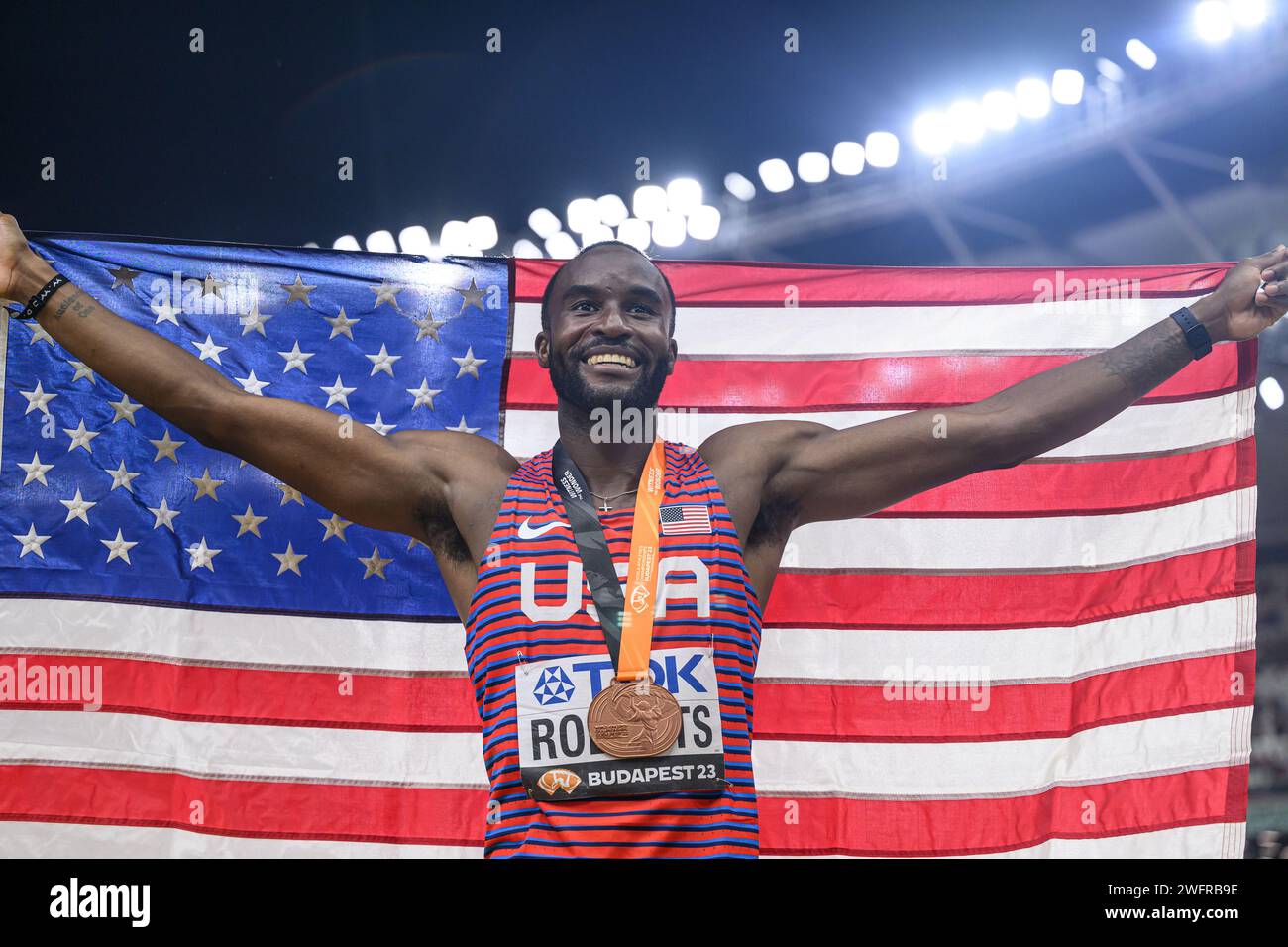 Daniel ROBERTS celebrating his medal with the flag in the Budapest 2023 ...