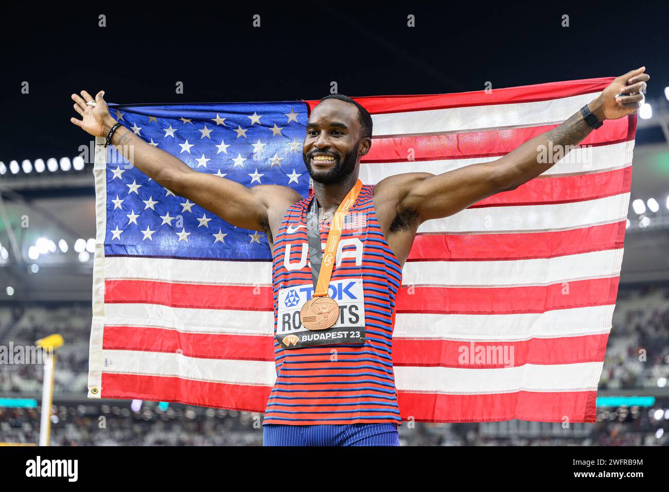 Daniel ROBERTS celebrating his medal with the flag in the Budapest 2023 ...