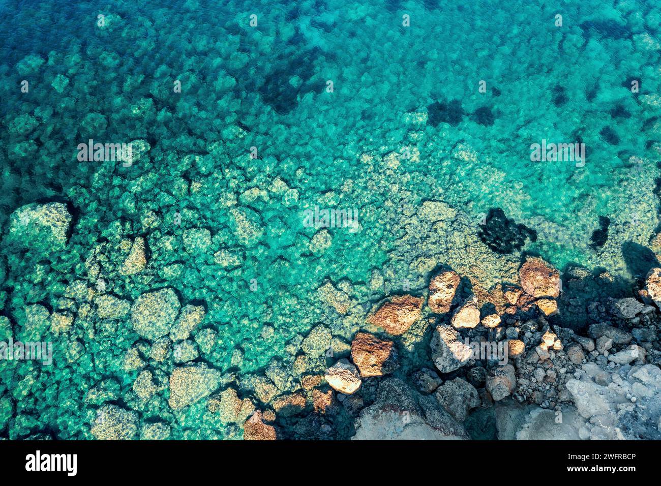 Aerial top down view of Cyprus ocean azure water surface, showcasing ...
