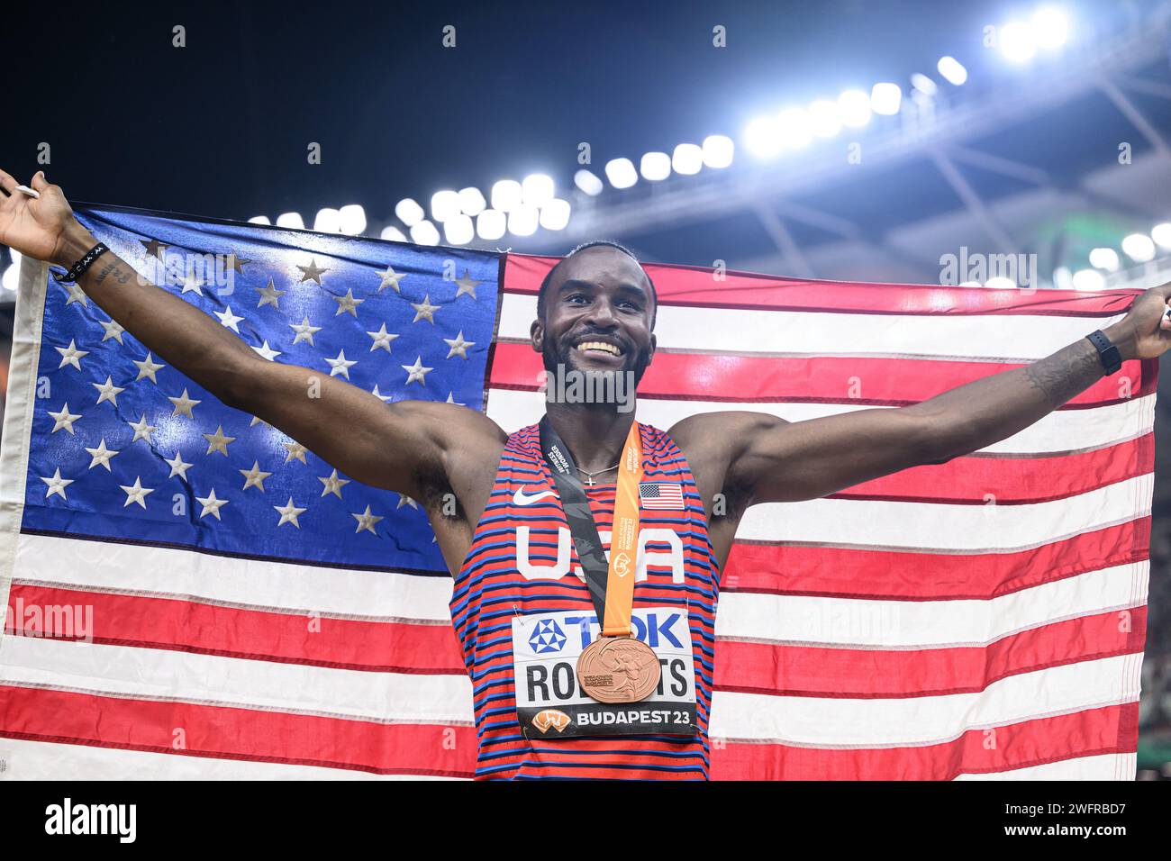 Daniel ROBERTS celebrating his medal with the flag in the Budapest 2023 ...